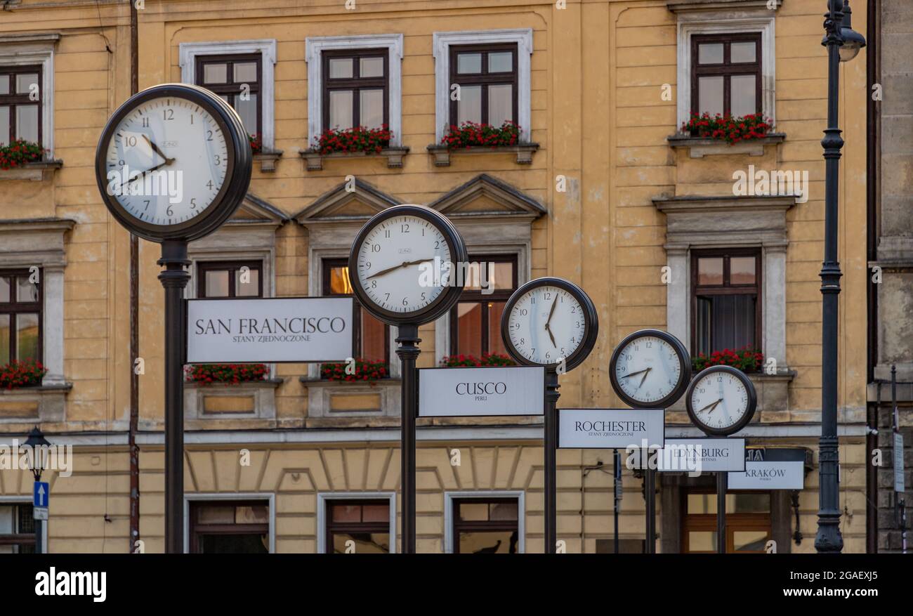 A picture of the city clocks on the Holy Spirit Square Stock Photo - Alamy