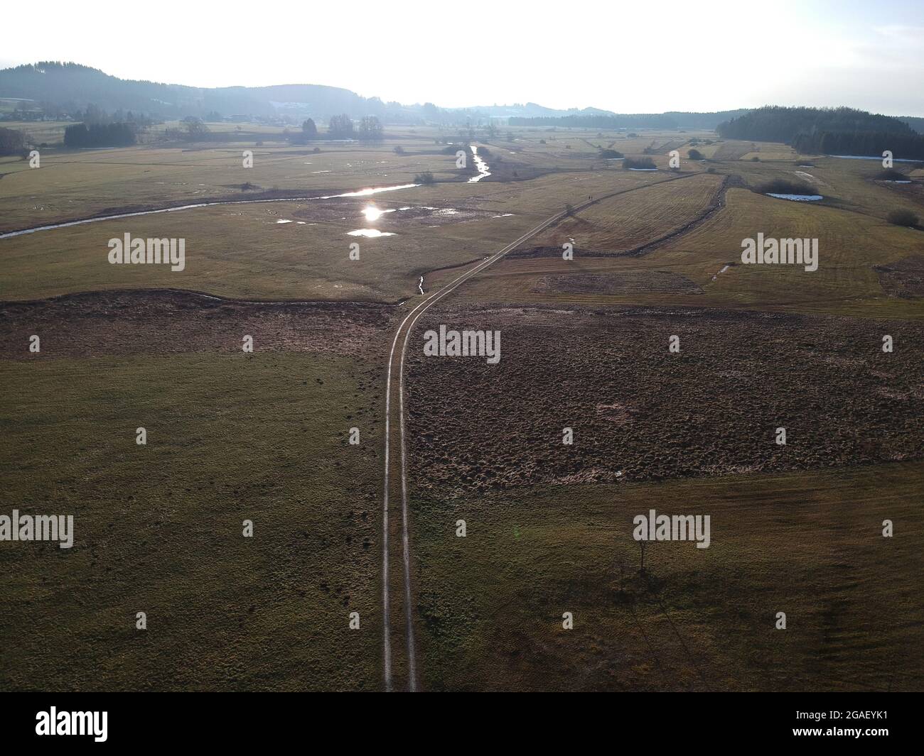 aerial landscape with path and field Stock Photo - Alamy