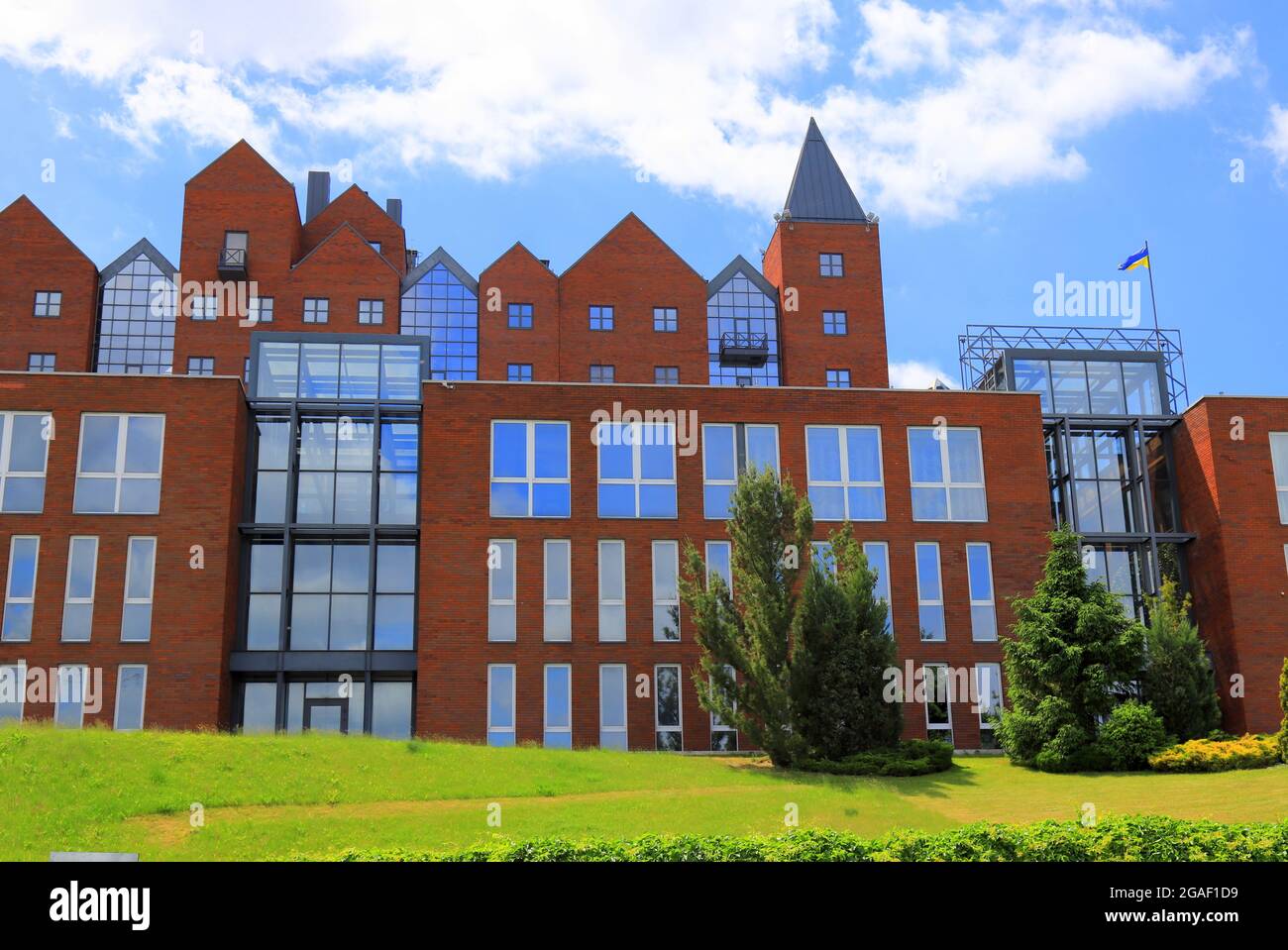 The red brick house on street of Ukrainian city Dnipro. Buildings and ...