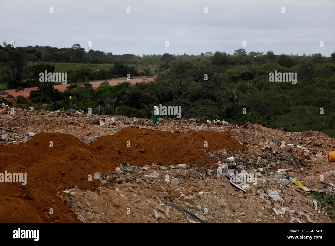 salvador, bahia, brazil - march 14, 2019: truck deposits garbage in a ...
