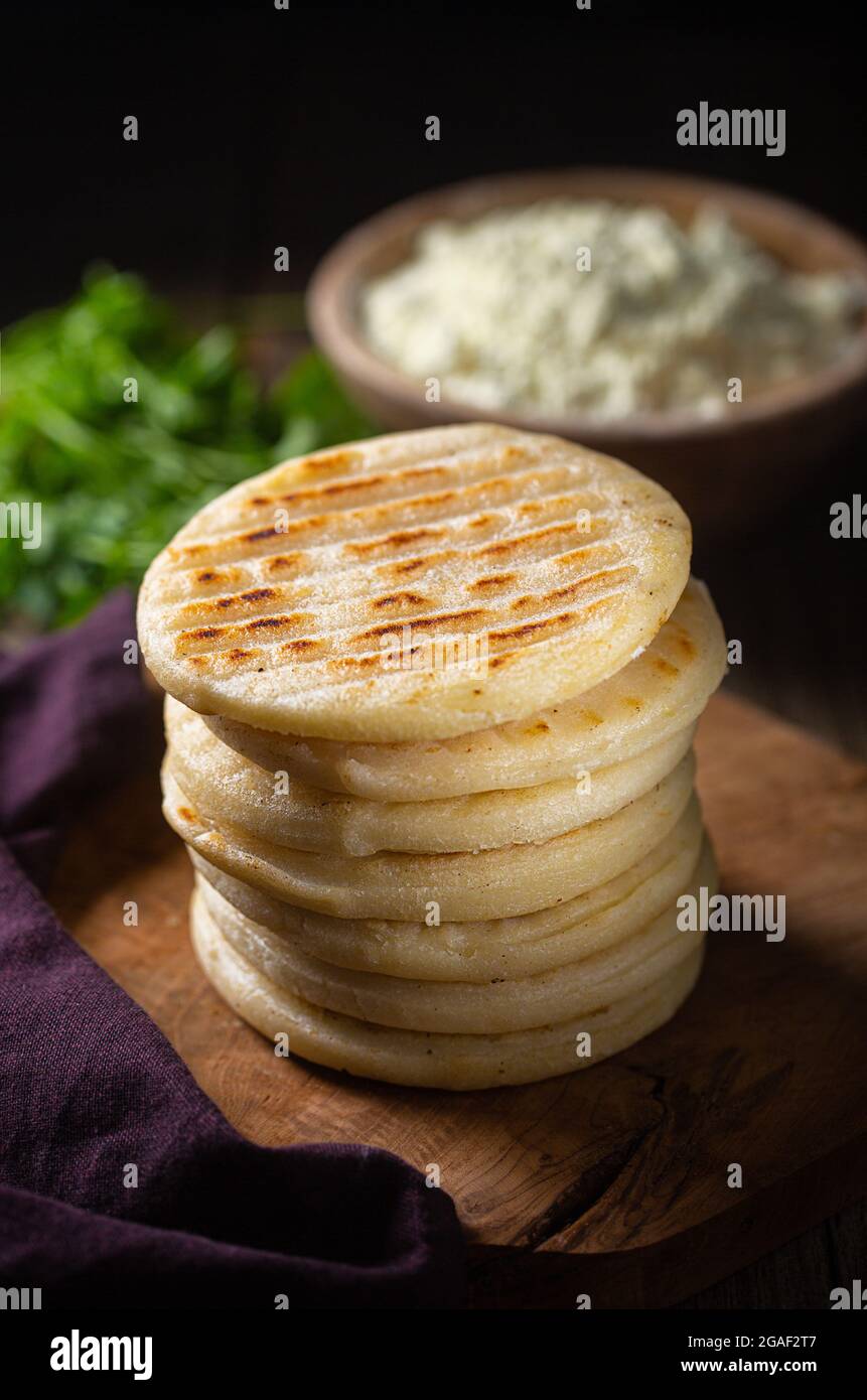 Arepa is a type of meal made from ground corn dough, cornmeal ...