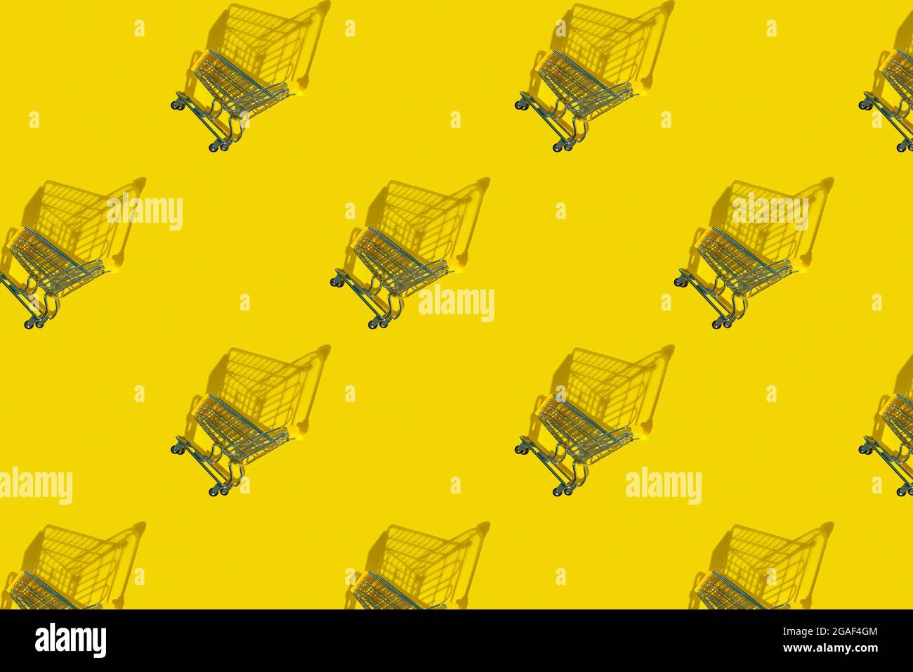 Shopping carts background with shadows, sale, yellow background ...