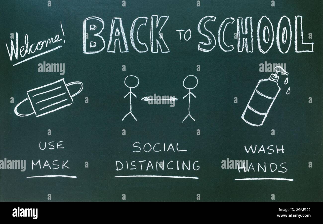 Blackboard written with school rules of coronavirus protection Stock ...