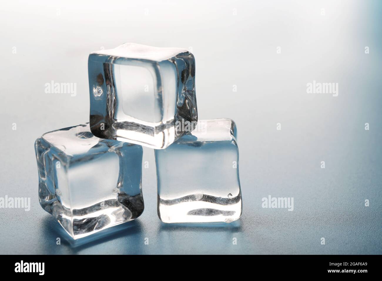 Perfect ice cubes on grey background, close up Stock Photo - Alamy