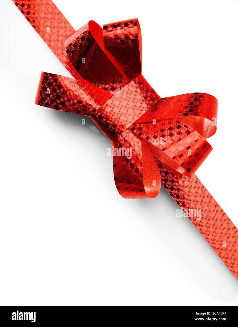 Red shiny ribbon bow isolated on white background Stock Photo - Alamy