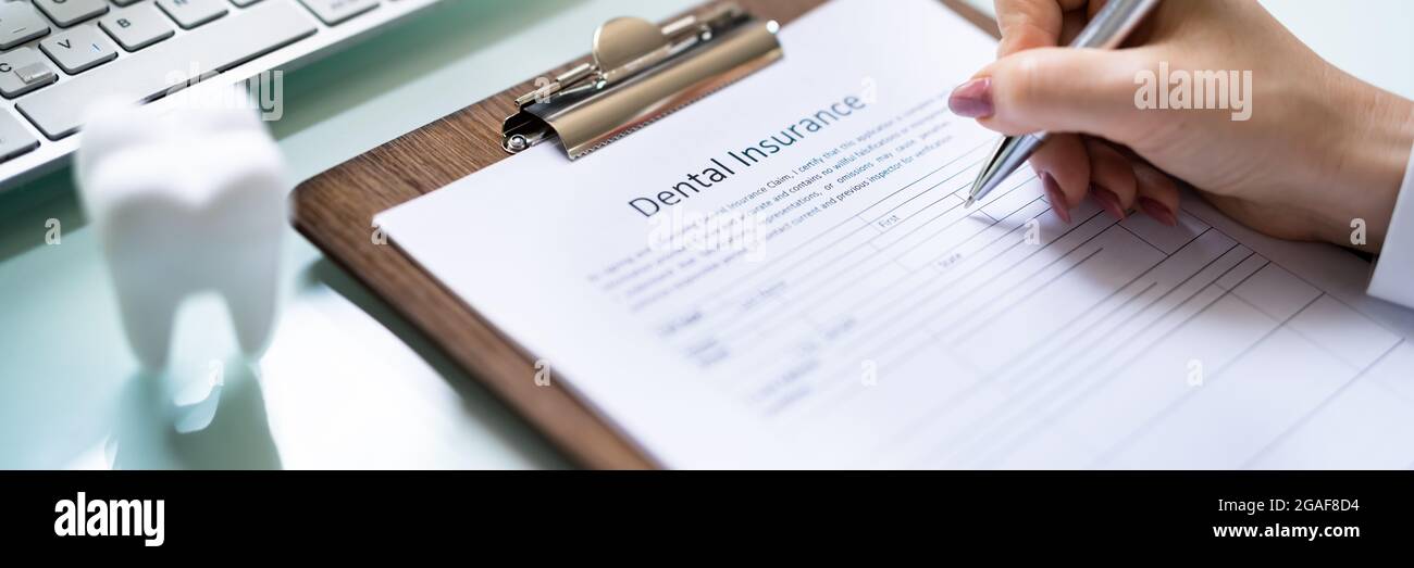 Dental Insurance Form On Desk. Dentist Teeth Service Stock Photo - Alamy