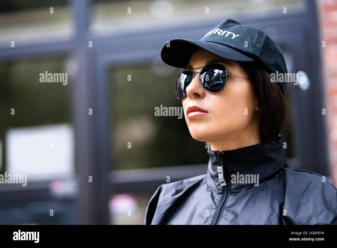 Security Guard Officer In Uniform. Guard Service Woman Standing Stock ...