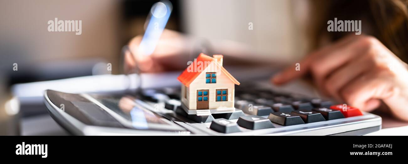 Calculating Asset Property Tax. Real Estate House Stock Photo - Alamy