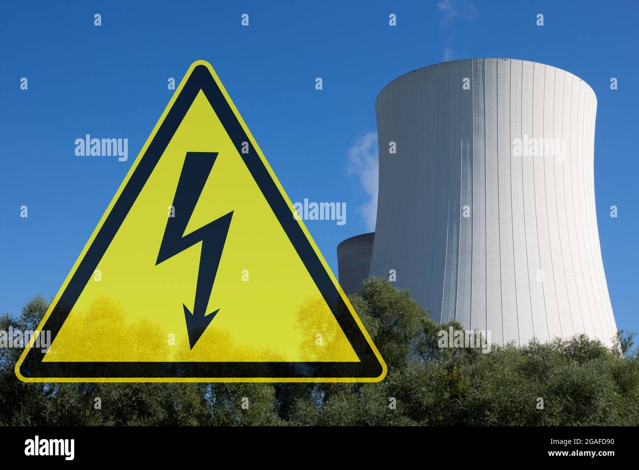 Electricity warning sign on an industrial oil refinery plant background ...