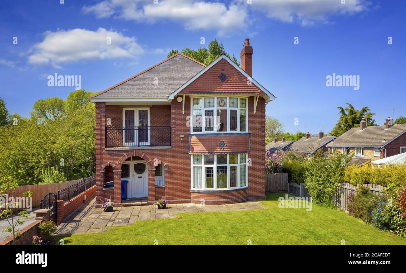 Traditional English detached house with garden Stock Photo - Alamy