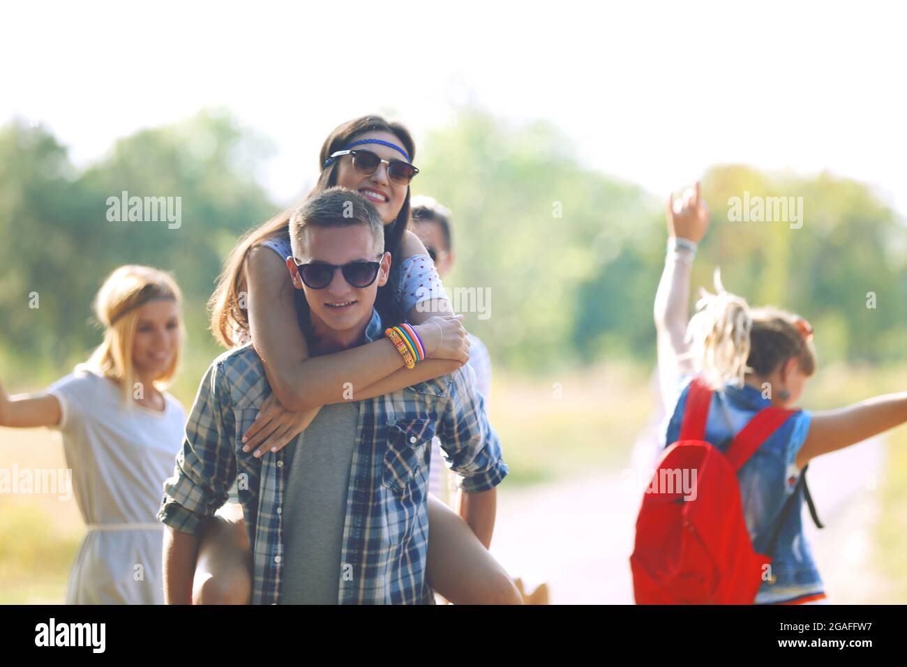 Happy smiling friends have fun, outdoors Stock Photo - Alamy