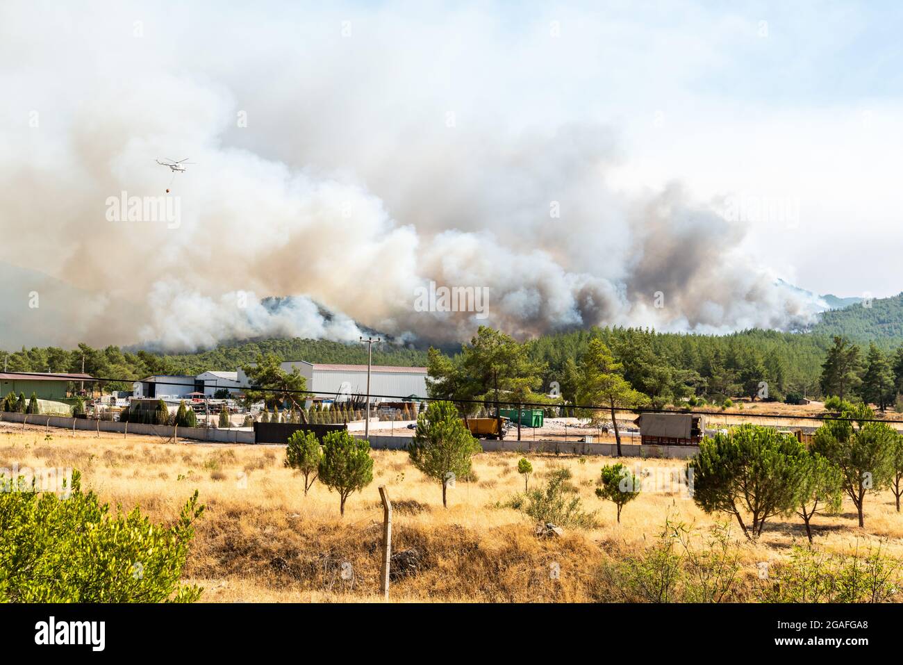 Marmaris, Mugla, Turkey – July 30, 2021. Smoke from a forest fire ...