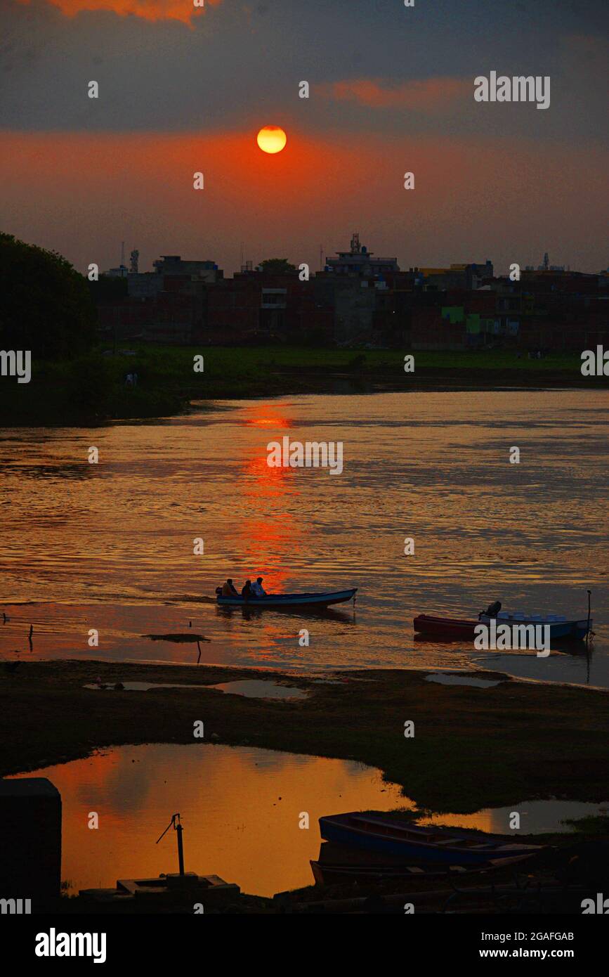 Lahore, Pakistan. 30th July, 2021. Pakistani people enjoying in Ravi ...
