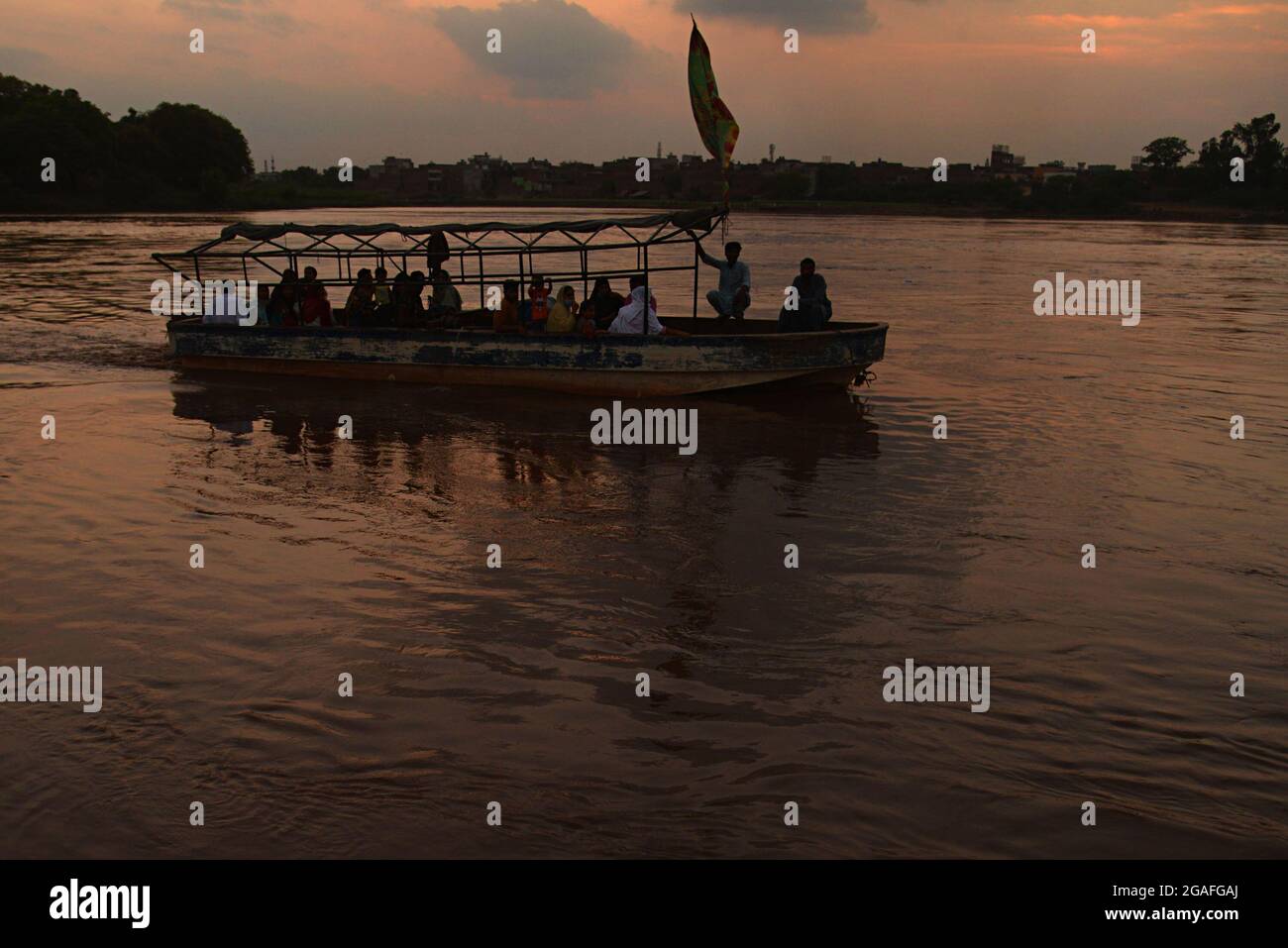 Lahore, Pakistan. 30th July, 2021. Pakistani people enjoying in Ravi ...