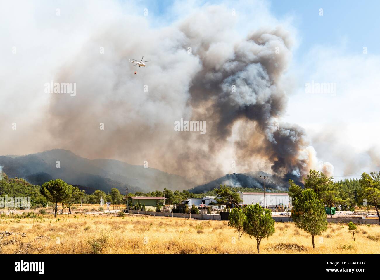 Marmaris, Mugla, Turkey – July 30, 2021. Smoke from a forest fire ...