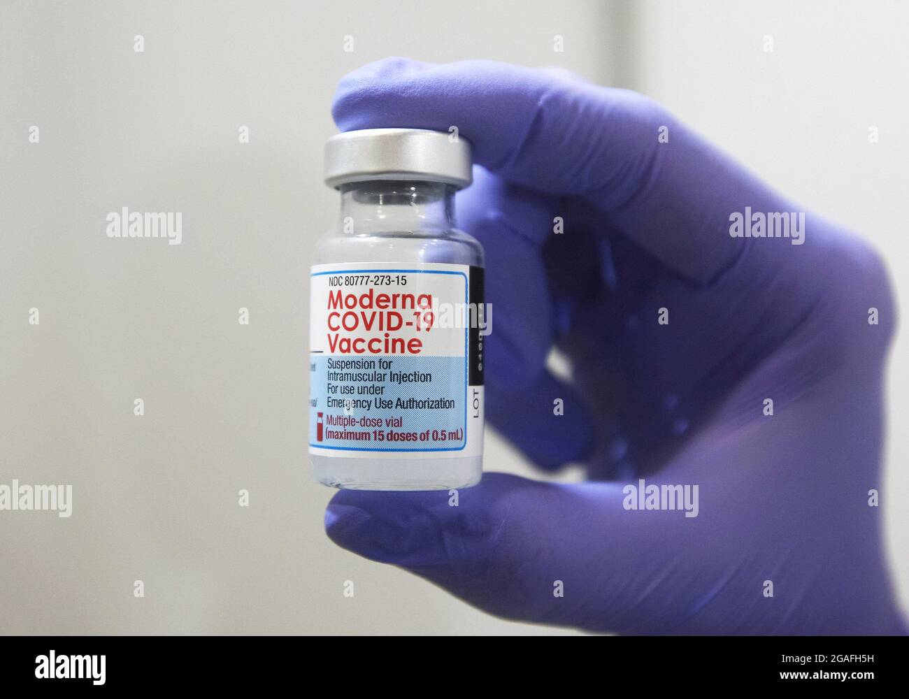 Kiev, Ukraine. 30th July, 2021. A medical worker holds Moderna COVID-19 ...