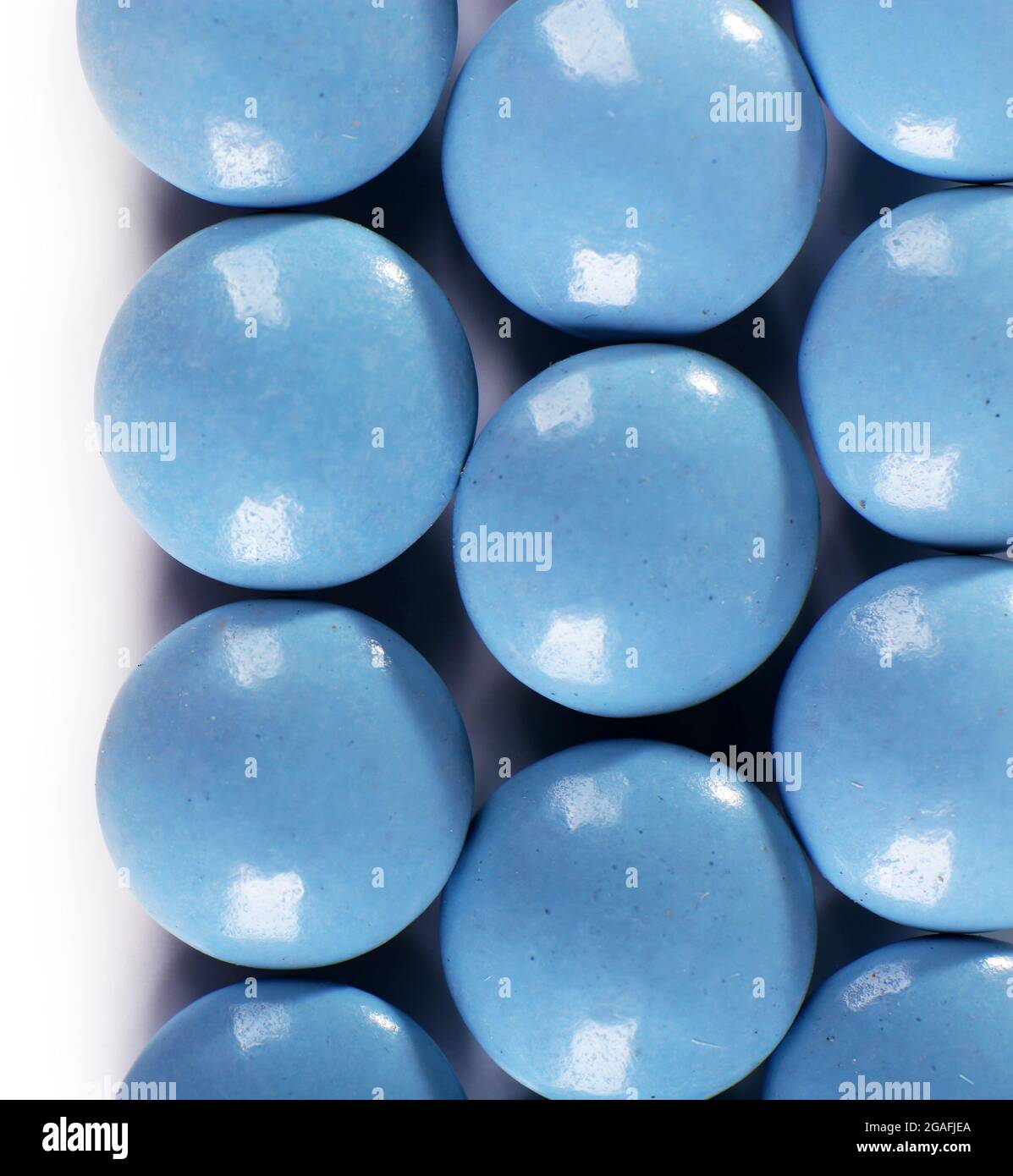 Blue drugs on white background, close up Stock Photo - Alamy