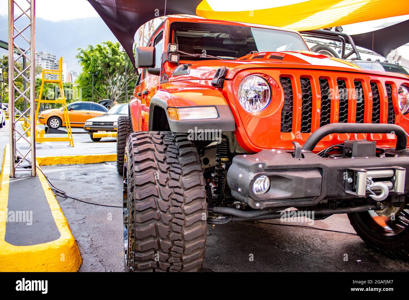 Shiny red mountain car at a car shop Stock Photo - Alamy