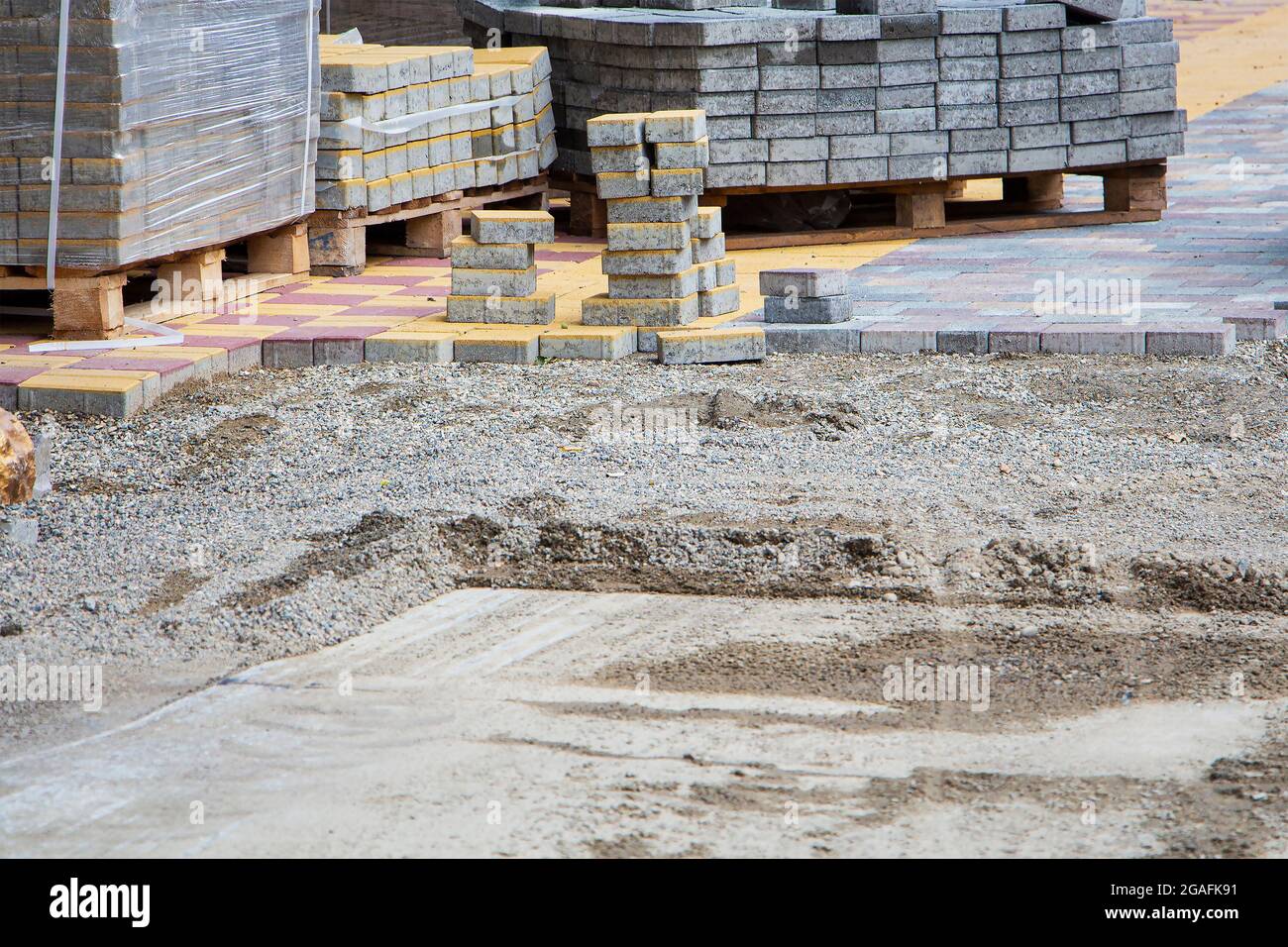 Process of construction of brick paved sidewalk, half built pavement ...