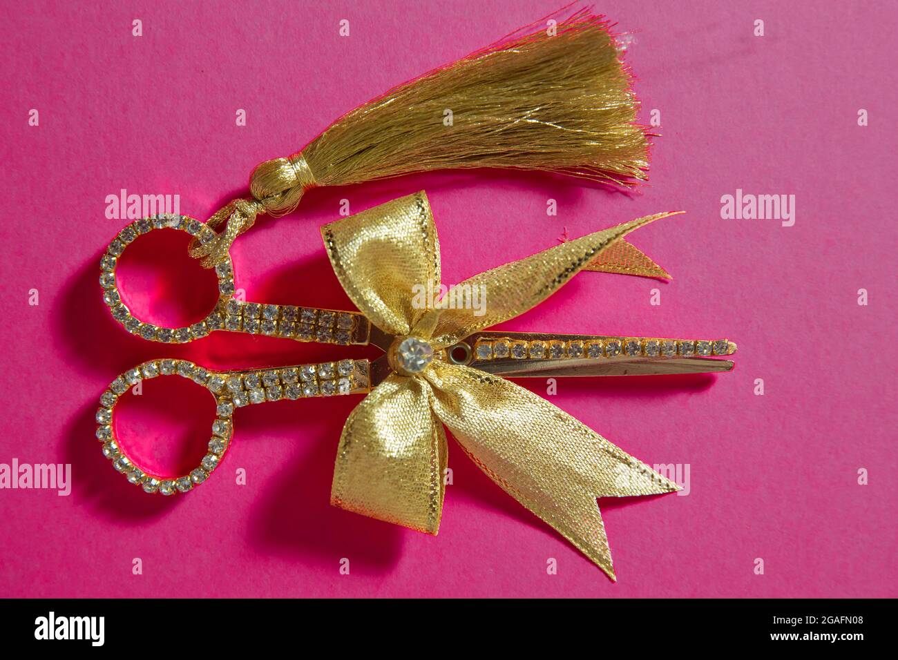 gold scissors pink flat lay minimal background . Pink ribbon on gold ...