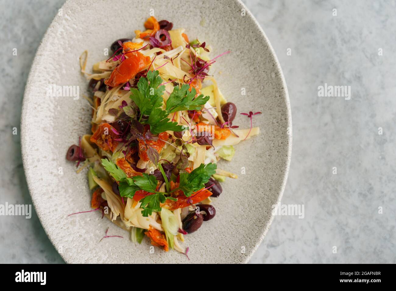 Salad in restaurant setting Stock Photo - Alamy