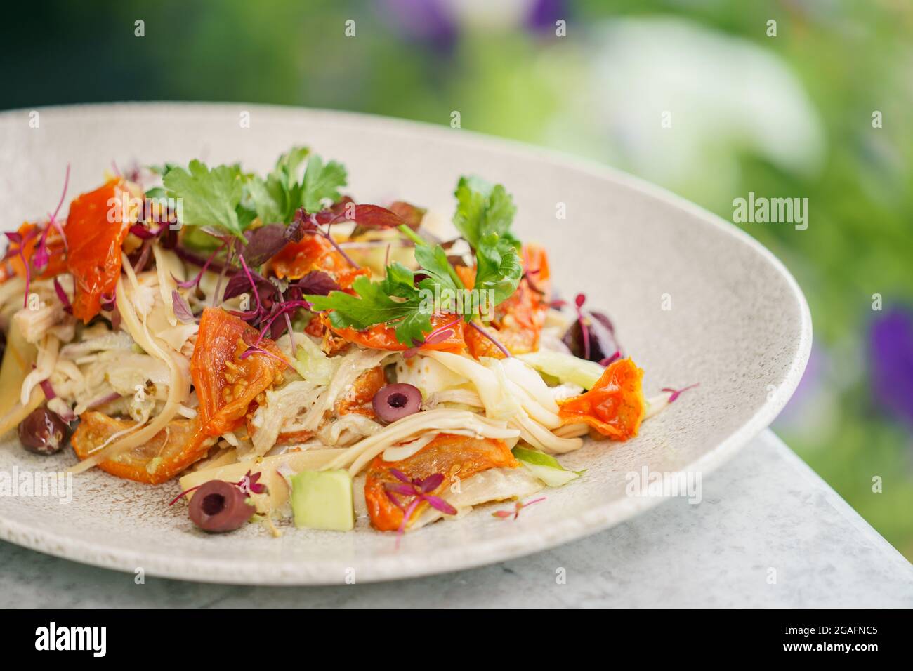 Salad in restaurant setting Stock Photo - Alamy