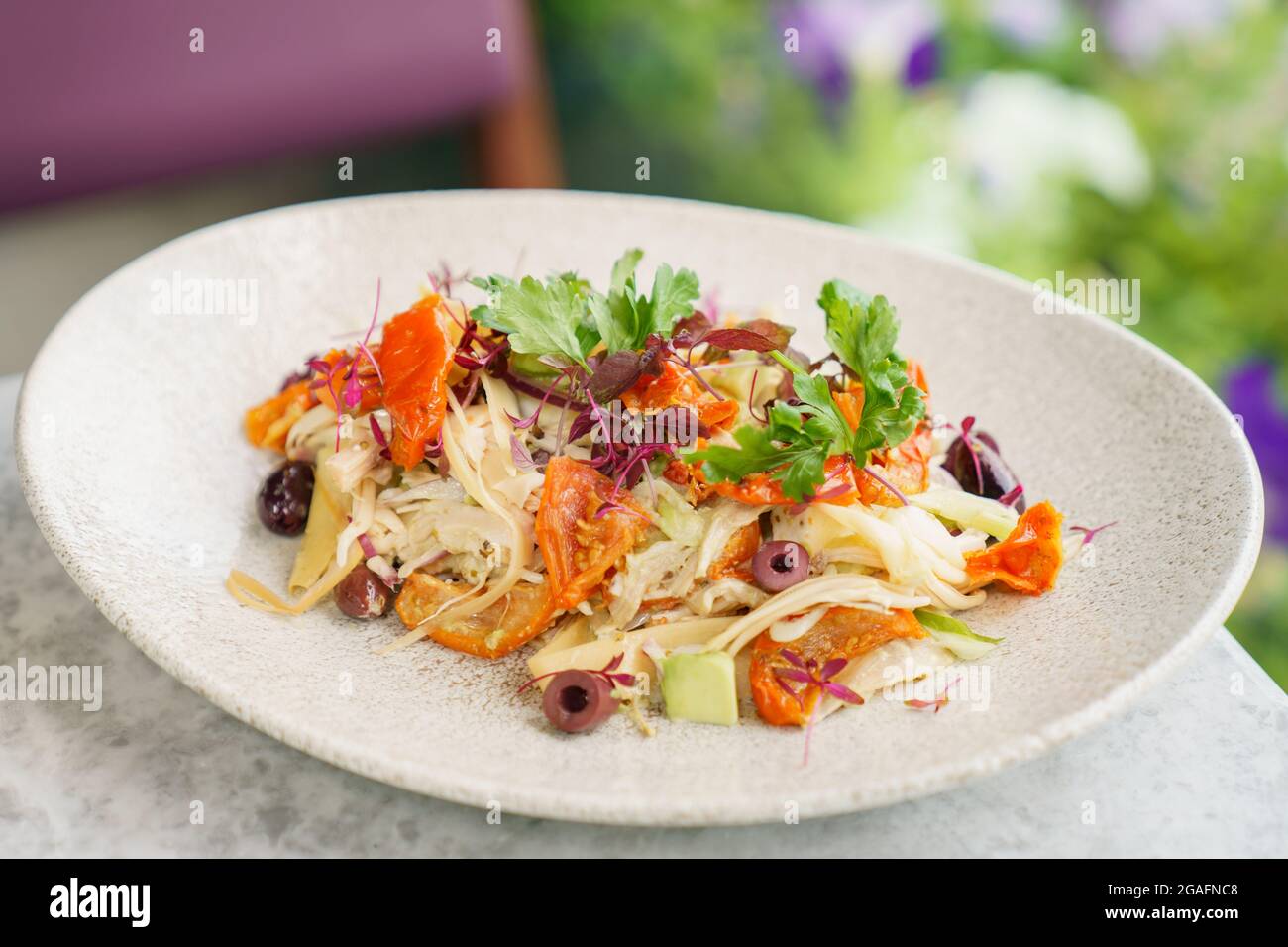 Salad in restaurant setting Stock Photo - Alamy