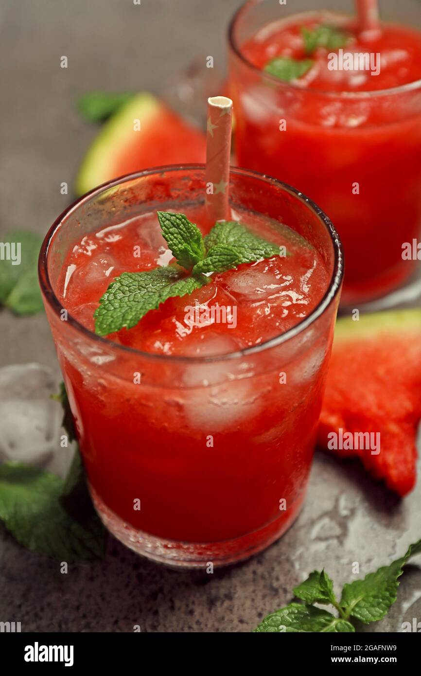Cold watermelon drinks in glasses, on dark background Stock Photo - Alamy