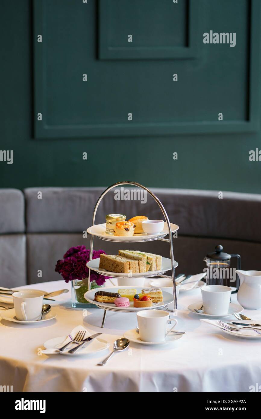 Gourmet Afternoon Tea offered at a restaurant Stock Photo - Alamy