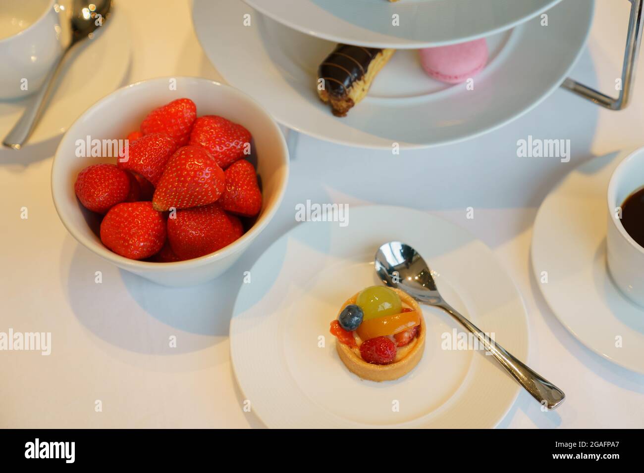 Gourmet Afternoon Tea offered at a restaurant Stock Photo - Alamy