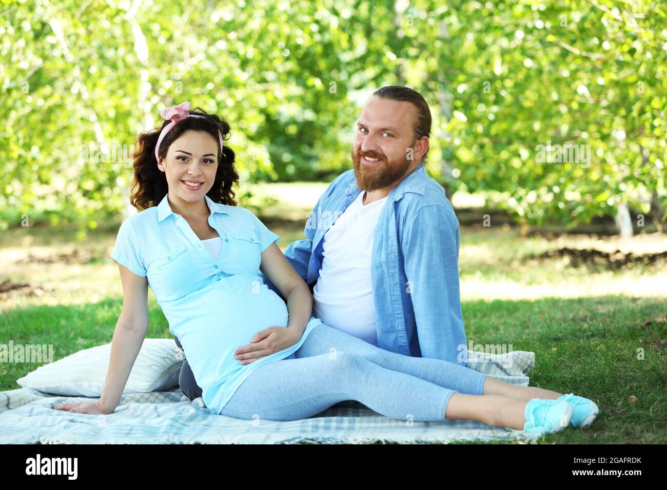 Happy moments in waiting baby's birth - man and woman together in the ...