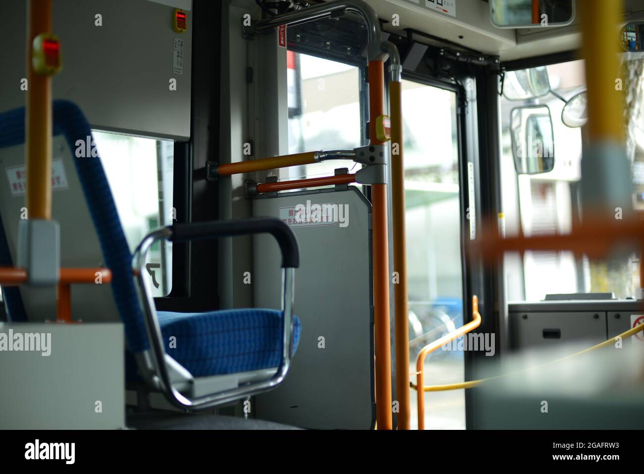 Inside of a city bus with empty passengers seats Stock Photo - Alamy