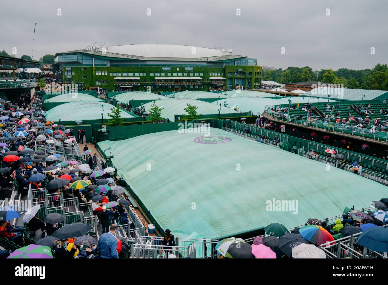 General view of covered courts in the rain during The Wimbledon ...