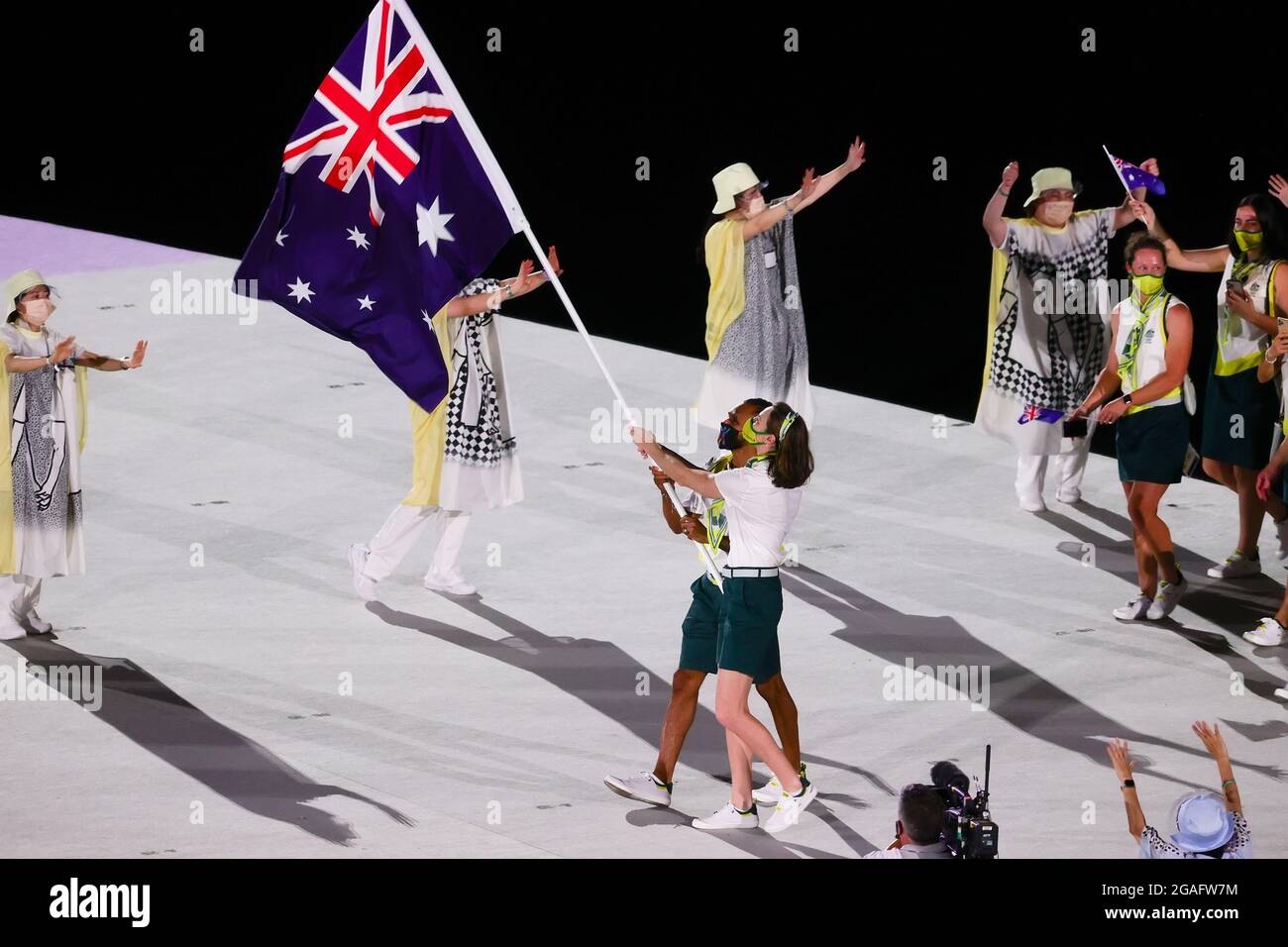 Tokyo, Japan, 23 July, 2021. Australia enter the arena with flag ...