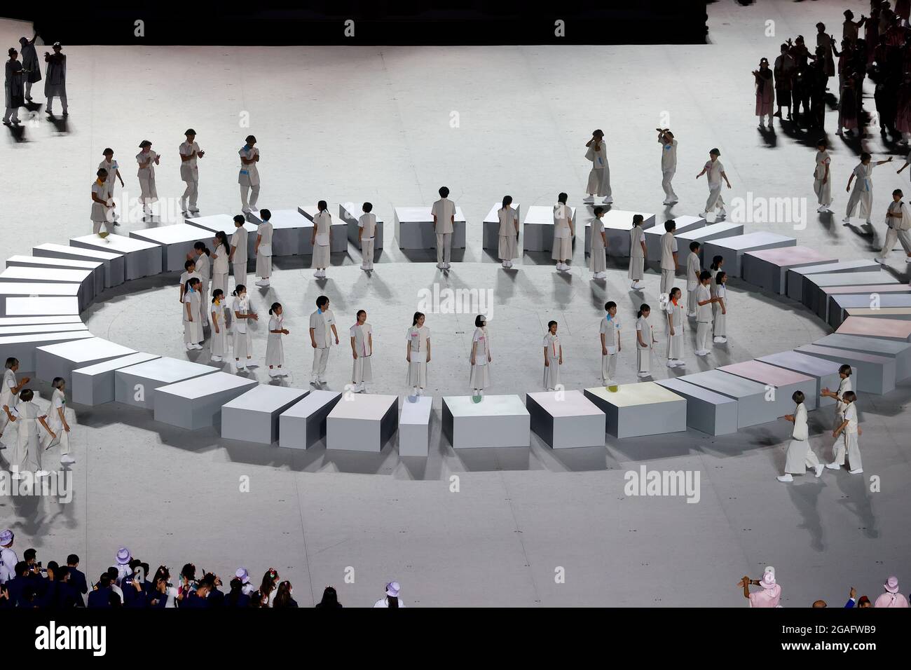 Tokyo, Japan, 23 July, 2021. Performers stand during the Opening ...