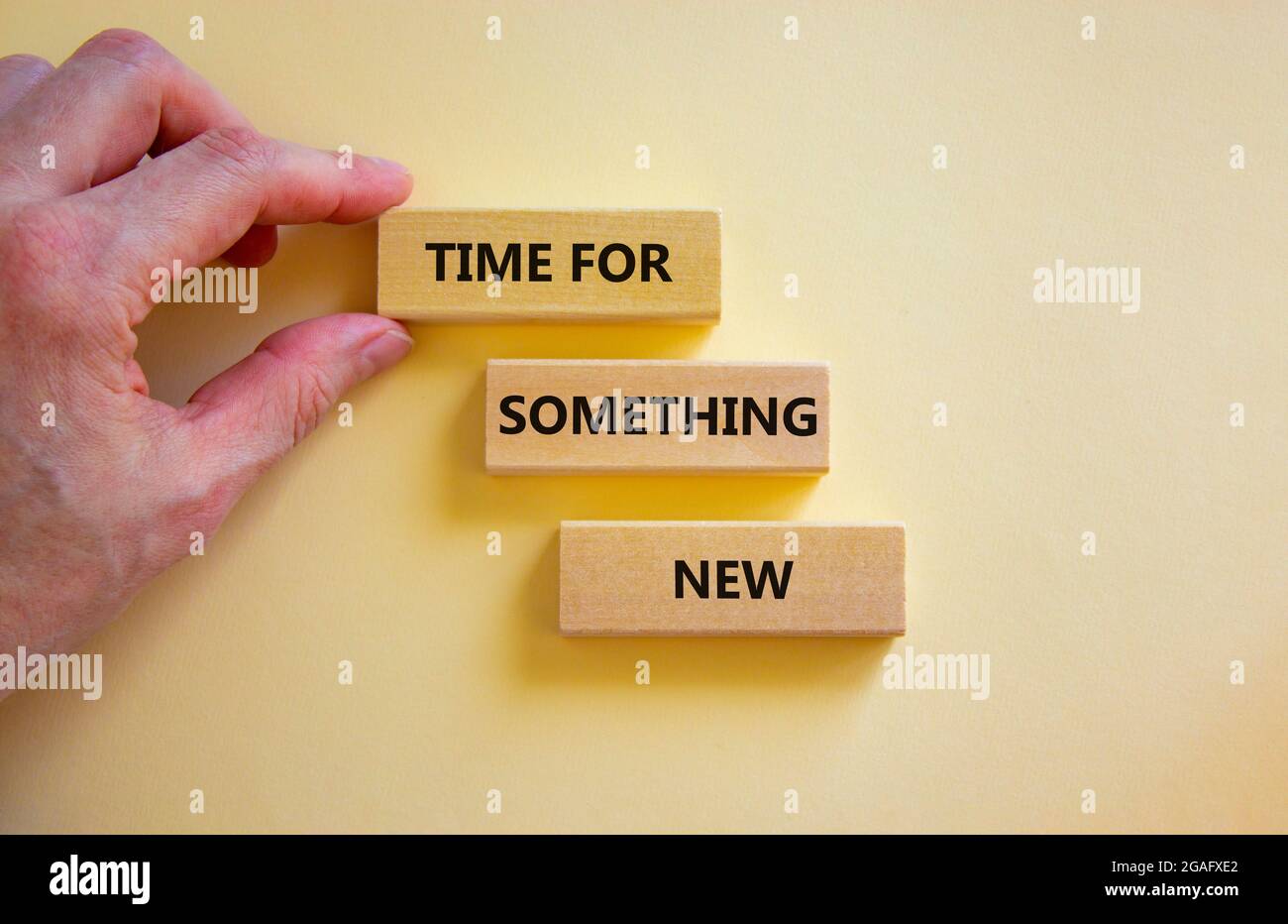 Time for something new symbol. Wooden blocks with words 'Time for ...