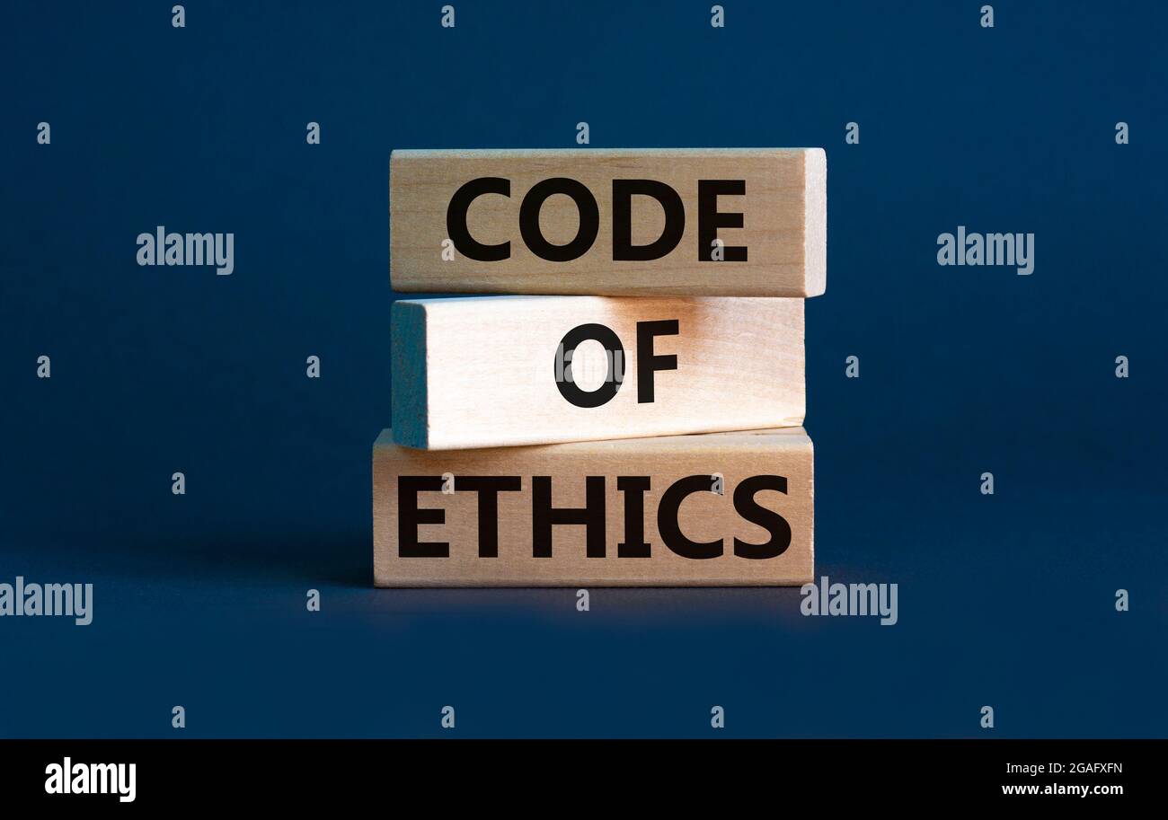Code of ethics symbol. Concept words 'Code of ethics' on wooden blocks ...