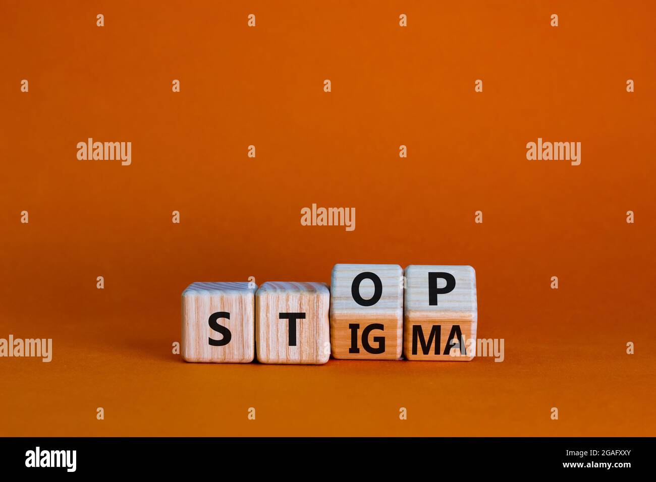 Stop stigma symbol. Turned wooden cubes with words stop stigma ...