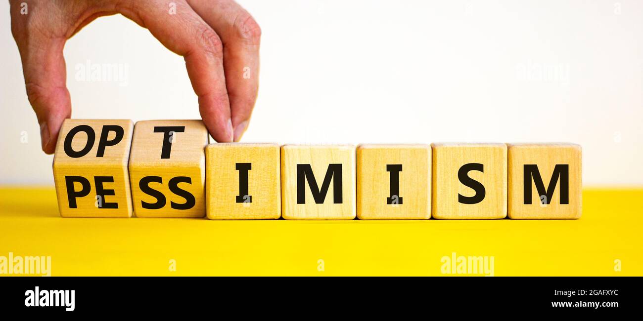 Pessimism or optimism symbol. Businessman turns cubes and changes the ...