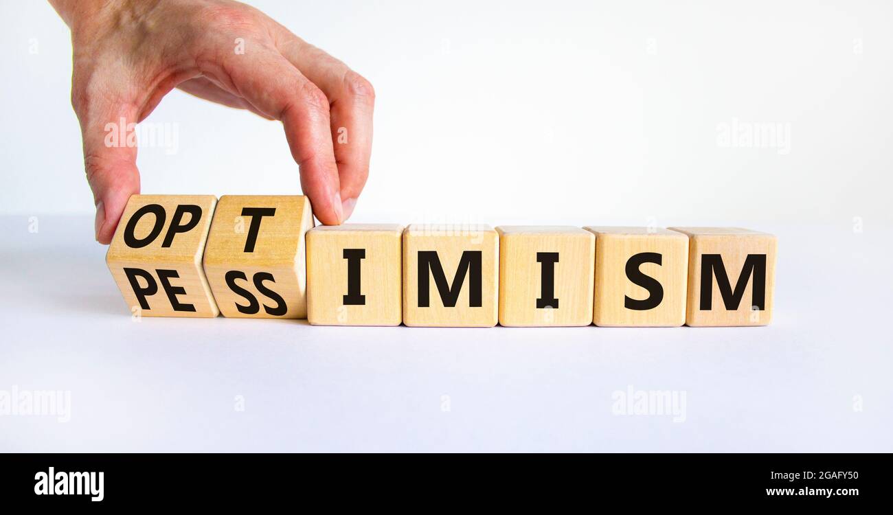 Pessimism or optimism symbol. Businessman turns cubes and changes the ...