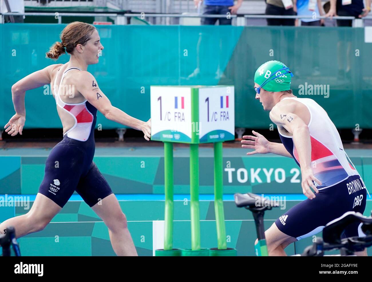 Great Britain's Jessica Learmonth (left) hands over to team-mate ...