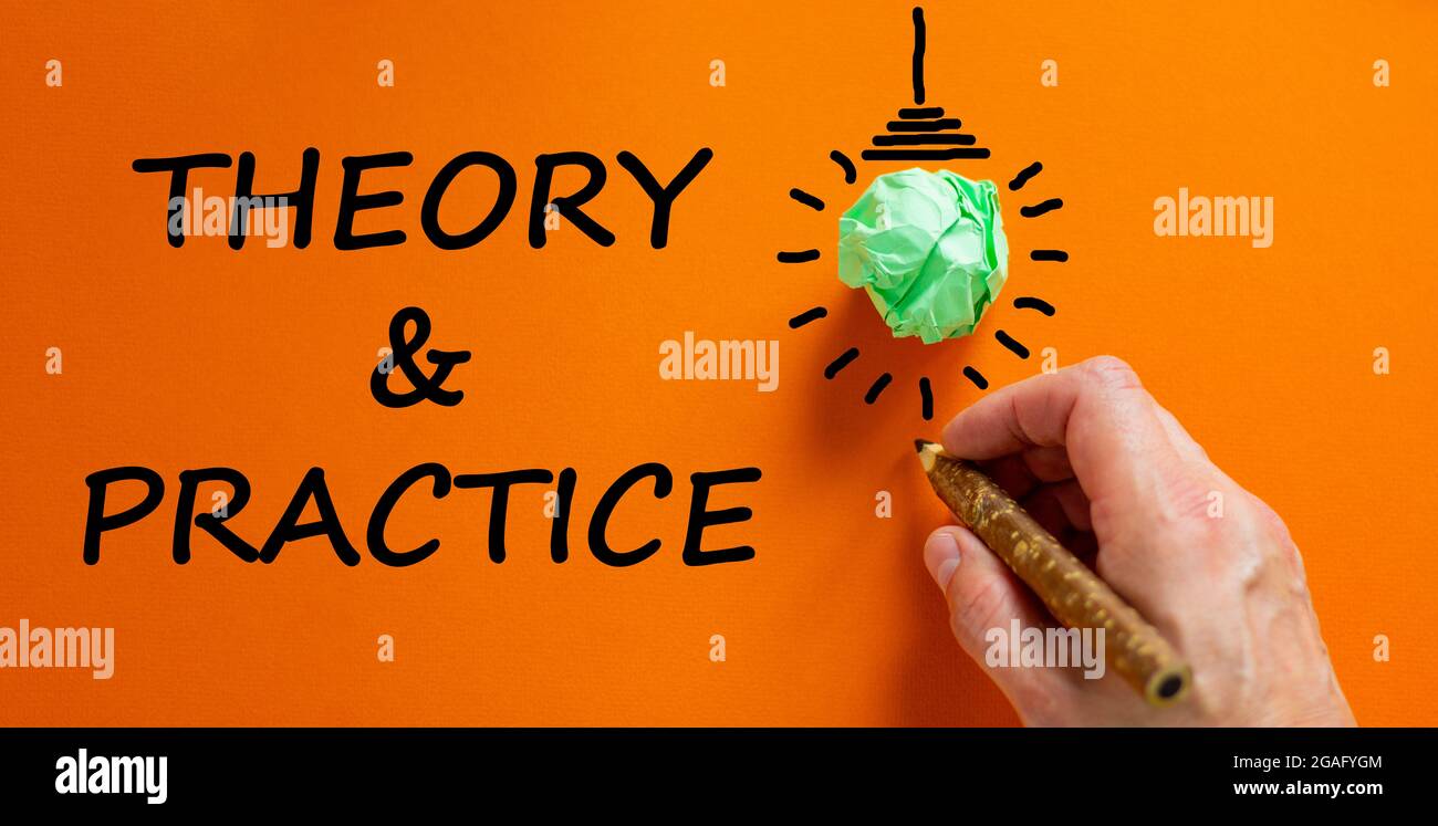 Theory and practice symbol. Businessman writing words 'Theory and ...