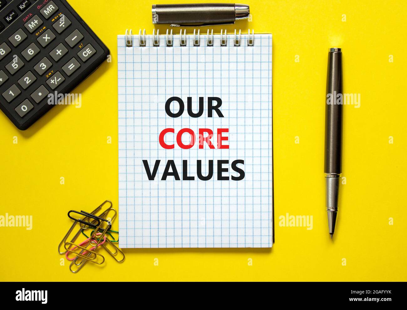 Our core values symbol. Words 'Our core values' on white note ...