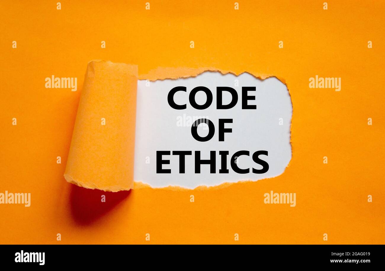 Code of ethics symbol. Words 'Code of ethics' appearing behind torn ...