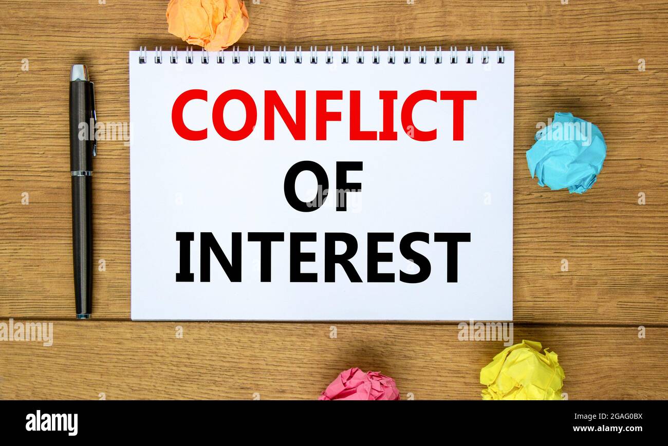 Conflict of interest symbol. Words 'Conflict of interest' on beautiful ...