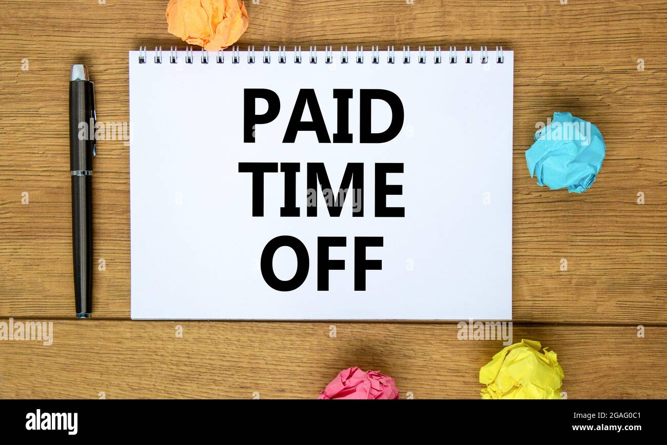 Paid time off symbol. Words 'Paid time off' on white note on beautiful ...