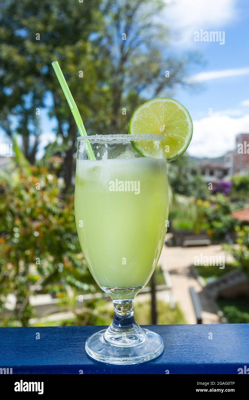 Refreshing lime green lemonade drink - Cold juice with ice Stock Photo ...