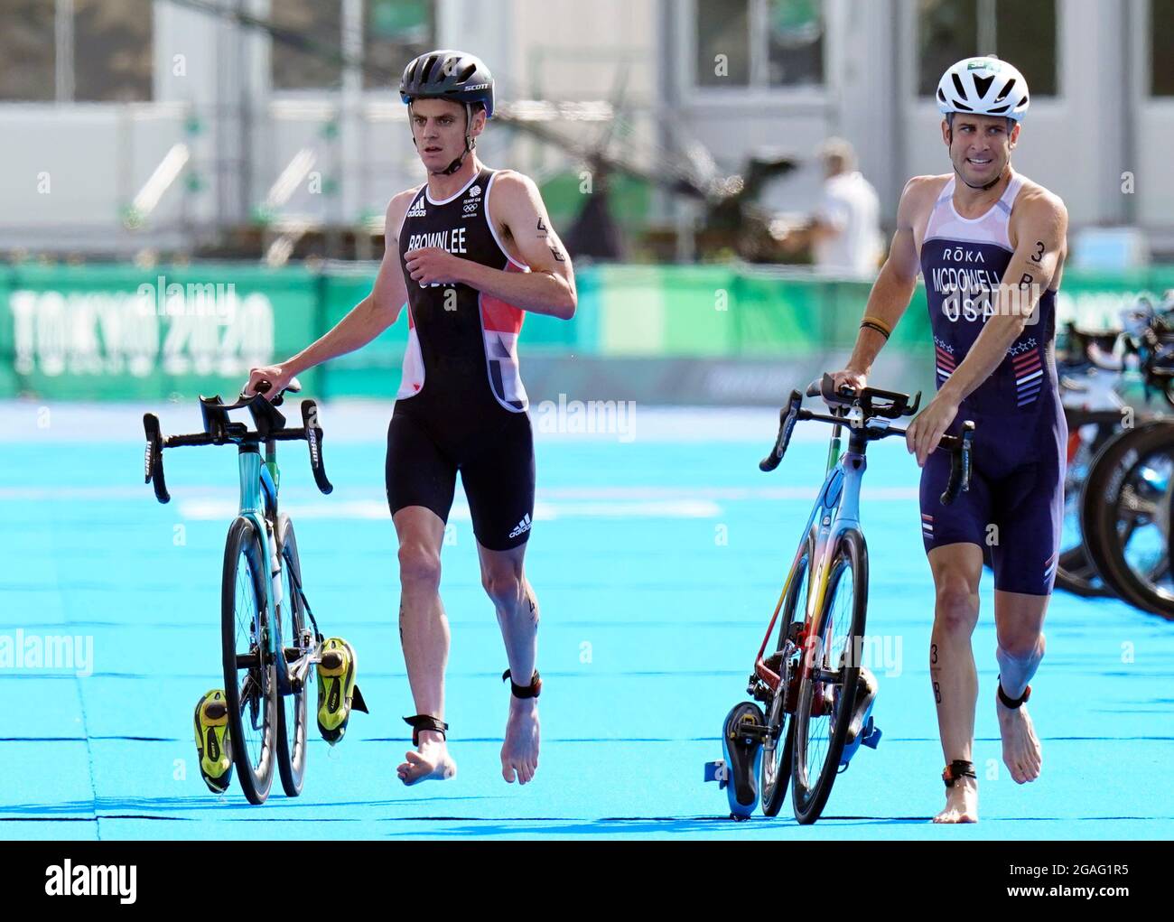 Great Britain's Alex Yee (left) and USA's Kevin McDowell collect their ...