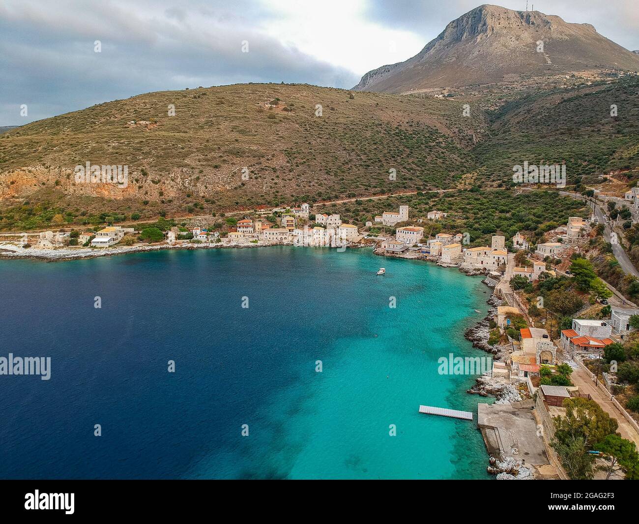 Iconic aerial view over the picturesque seaside Limeni village in Mani ...