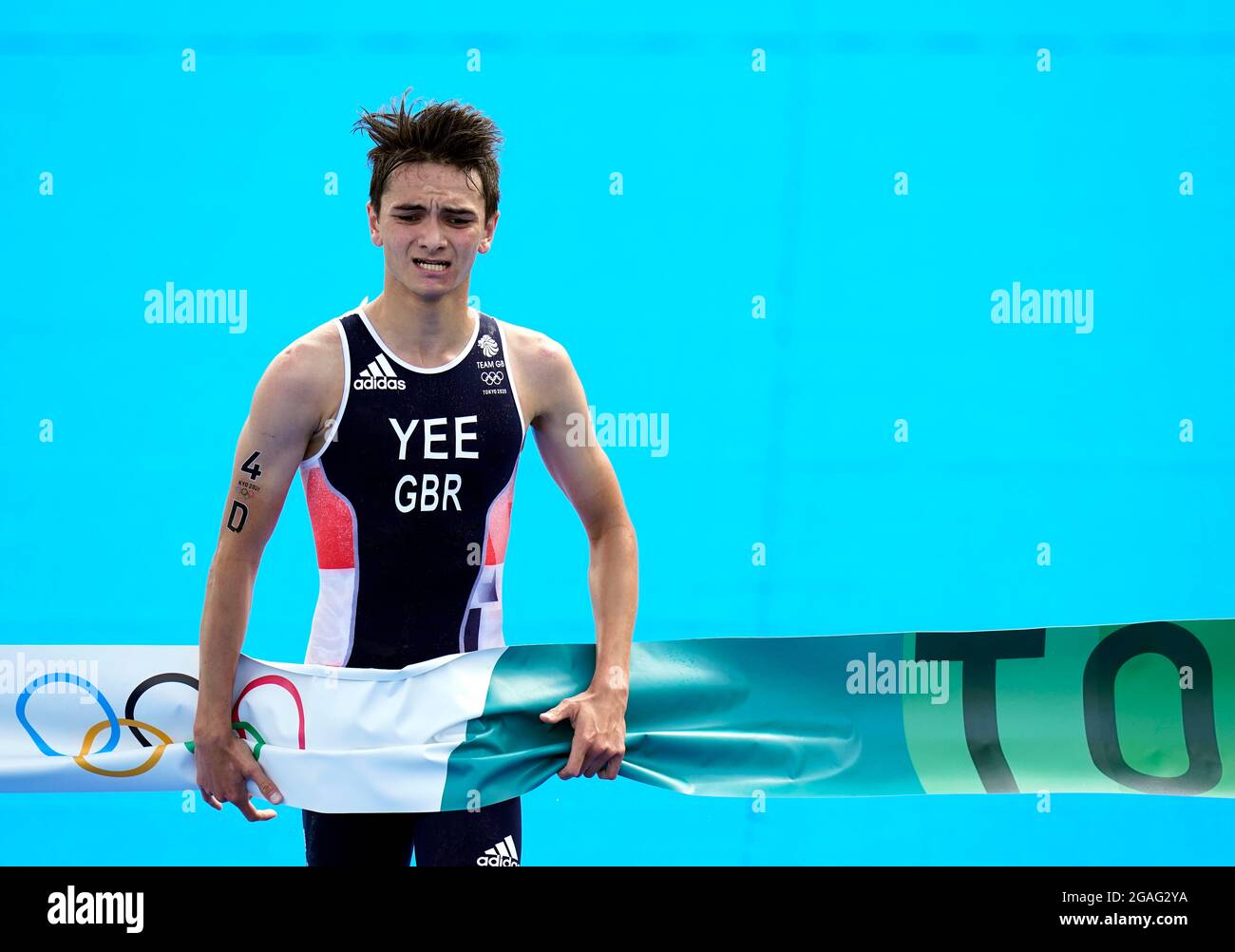 Great Britain's Alex Yee crosses the finish line in the Triathlon Mixed ...
